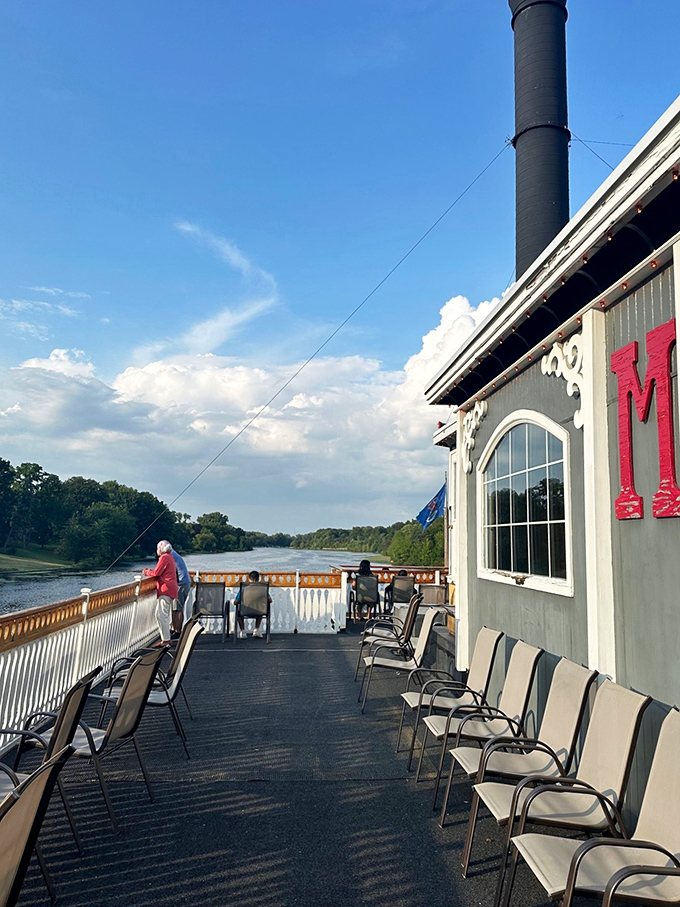 The outdoor deck offers a moment of respite from sleuthing, with comfortable seating and panoramic river views.