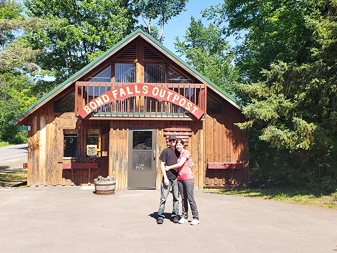 The rustic Bond Falls Outpost stands ready to welcome weary travelers, like a friendly wilderness concierge who doesn't judge your hiking attire.