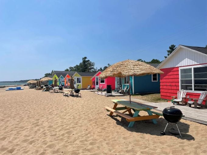 The vibrant cottages create a striking contrast against the natural landscape &ndash; a photographer's dream come true.