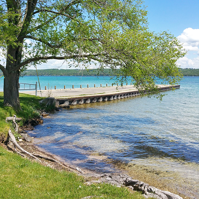 This weathered pier tells stories of countless summer memories &ndash; where generations have dangled feet in waters too beautiful to be believed.