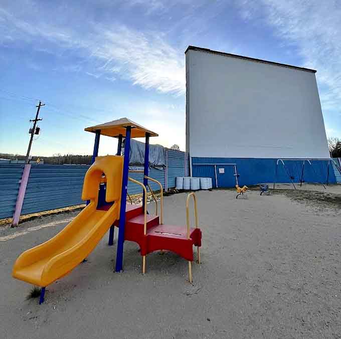 The playground sits in perfect view of the big screen. Little legs need stretching between cartoon shorts and feature films.