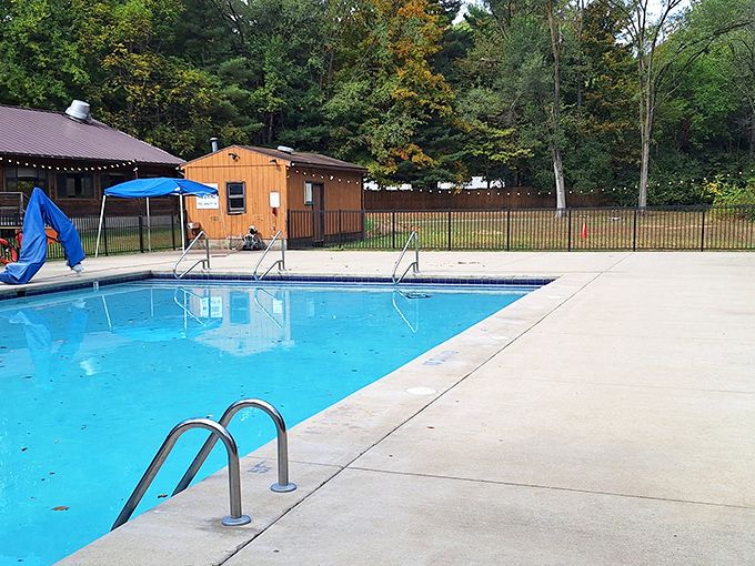 Cool blue respite: The campground's swimming pool provides refreshing relief after underground explorations in Michigan's summer heat.