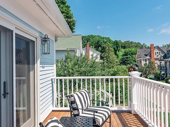 Private Balcony: Striped cushions invite afternoon napping on this private perch where island breezes carry the distant sounds of clip-clopping hooves.