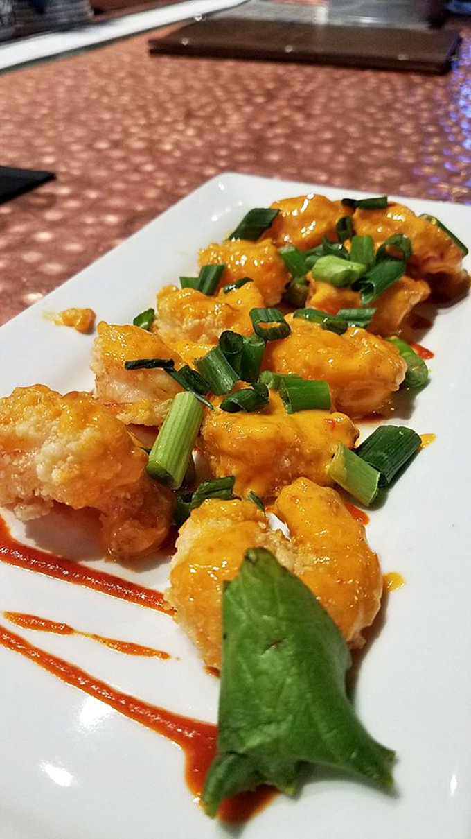 These crispy shrimp tossed in tangy sauce and garnished with fresh scallions prove Ford's Garage isn't just about burgers, they've got range under the hood.