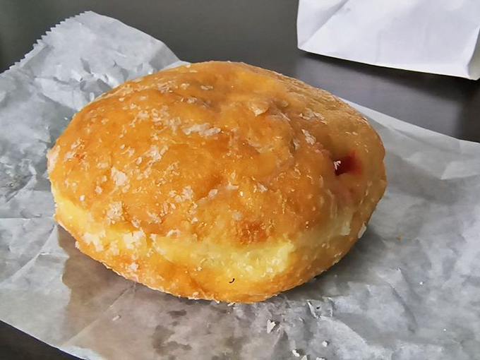 Golden, glazed perfection – this simple-looking pastry delivers complex flavors that have kept locals returning since the bakery's early days.