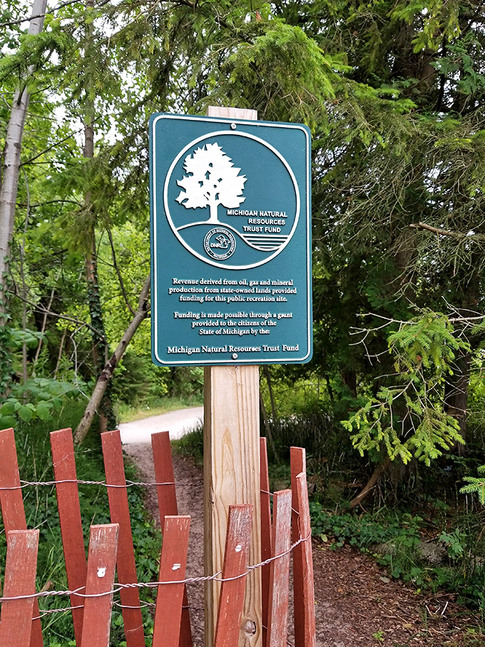 The Michigan Natural Resources Trust Fund sign marks the entrance to this protected paradise, basically saying "you're welcome" on behalf of smart planning.