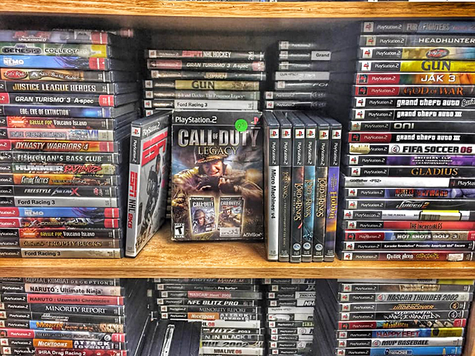 PlayStation titles stack like colorful bricks of digital nostalgia, with Call of Duty standing at attention among racing games and sports classics.