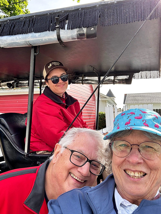 Happy travelers capture memories of their journey, their smiles reflecting the simple joy that comes from unhurried exploration.