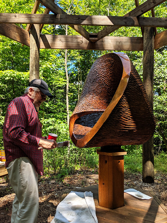 This golden dome nestled among the trees looks like it might have fallen from a fairy tale castle, creating an unexpected moment of wonder.