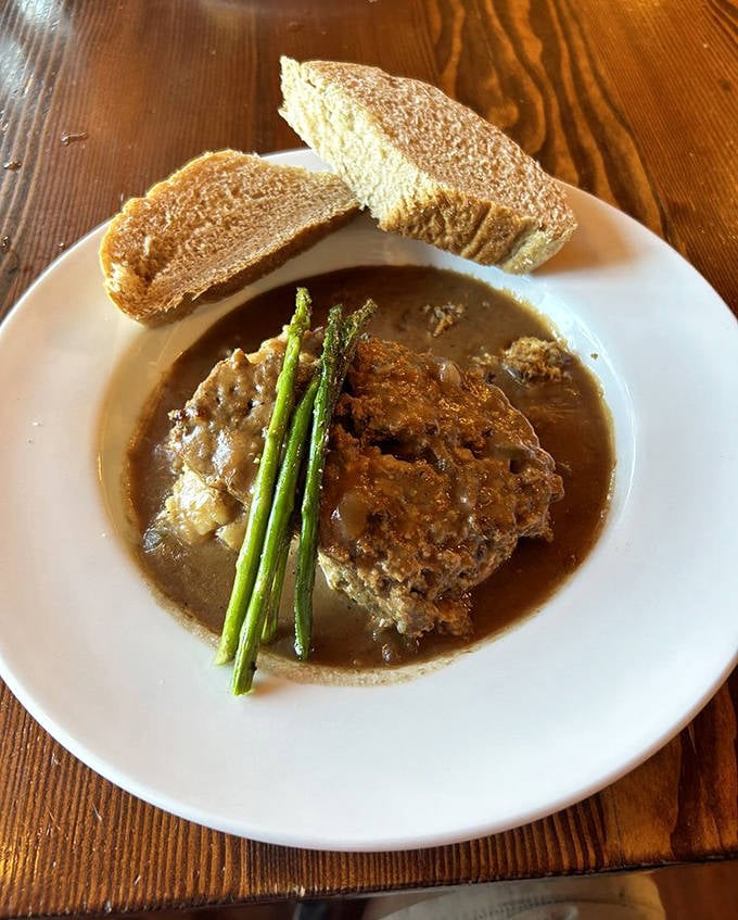 Wild rice meatloaf with gravy so good you'll be tempted to lick the plate when nobody's looking.