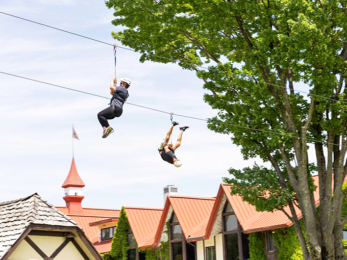 Thrill-seekers take zipline adventures to new heights&mdash;literally&mdash;as they soar above the Highlands' distinctive Tudor-style architecture.