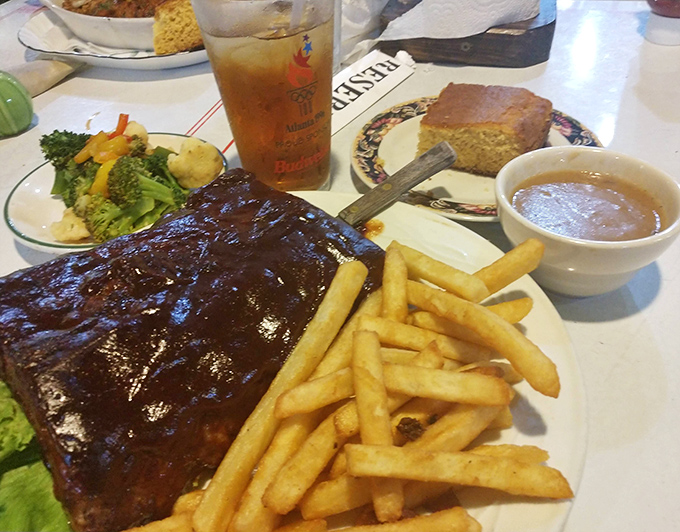 A plate that hits all the right notes &ndash; smoky ribs, golden fries, and enough sauce to make you thankful for the extra napkins.