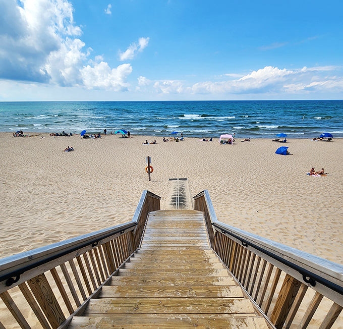 The descent to paradise &ndash; wooden steps lead beach-goers to their reward after the brief but anticipation-building journey through protected dunes.