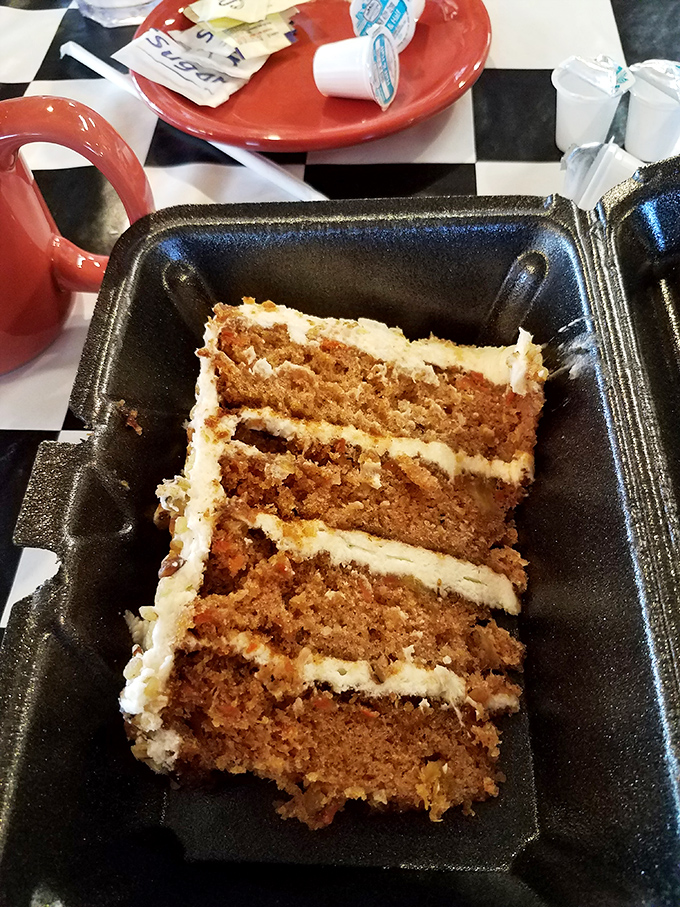 Carrot cake standing three layers tall &ndash; a monument to what happens when vegetables fulfill their highest purpose in life.