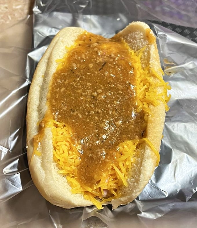 Behold the classic chili cheese dog in all its messy glory &ndash; a beautiful testament to why some culinary traditions should never change.