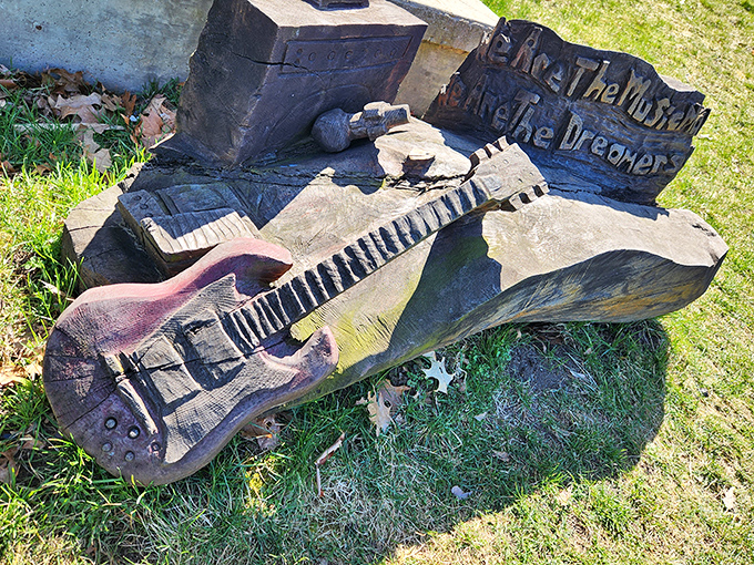 Even musical instruments get the fantasy treatment here, with this carved guitar reminding visitors to "share the music, live the dreams."