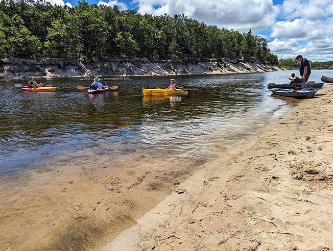 Kayaking adventures await on calm waters, where paddlers of all ages explore the shoreline from a unique water-level perspective.
