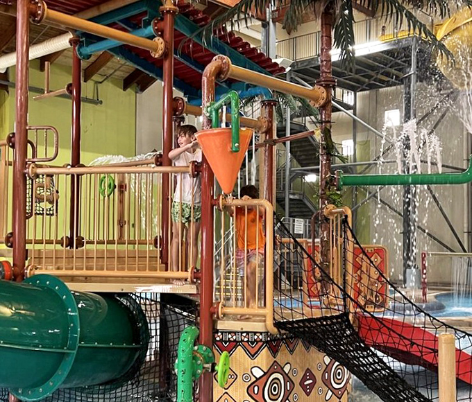 The play structure becomes command central for pint-sized adventurers, complete with water features that guarantee delighted squeals.