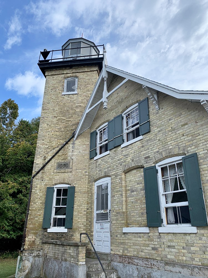 A friendly peek at the historic Eagle Bluff Lighthouse! What a charming piece of history.