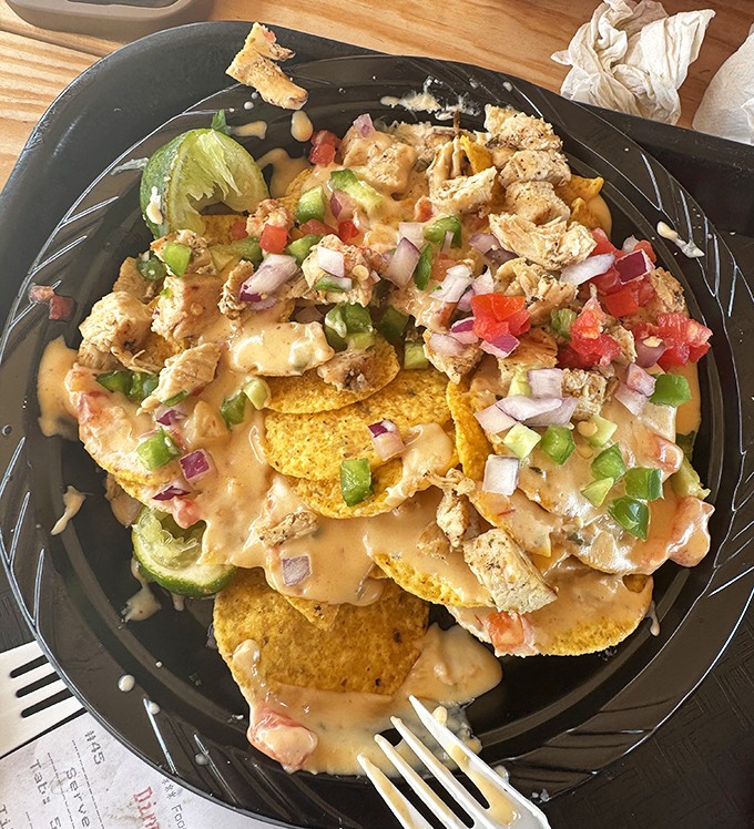 Nachos that require a strategy to eat &ndash; like a delicious game of Jenga where everyone wins, especially your taste buds.