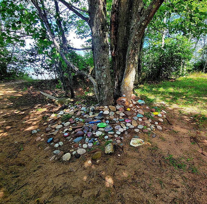 Community creativity meets natural wonder: Visitors have created this heartwarming memorial of painted stones, adding human stories to geological history.