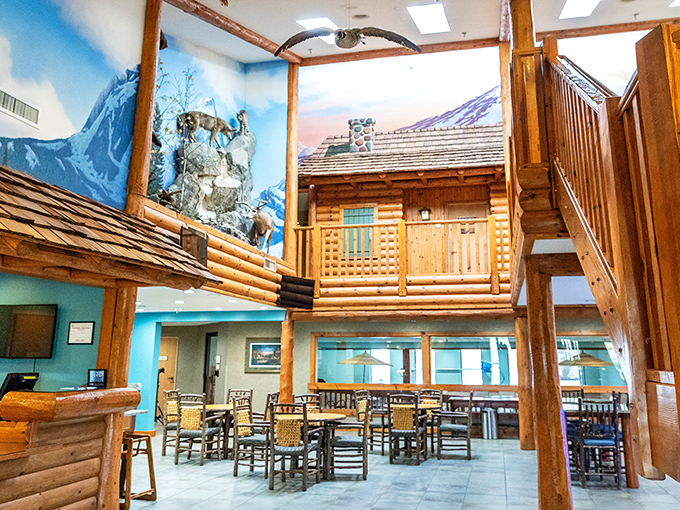 Wildlife displays and rustic decor create an immersive mountain lodge atmosphere that transports visitors beyond Michigan's borders.