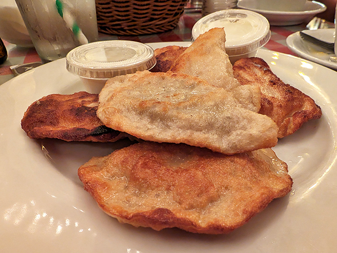 Pierogi perfection &ndash; these hand-pinched pockets of joy showcase the beautiful simplicity of Polish cuisine, where humble ingredients transform into something magical.