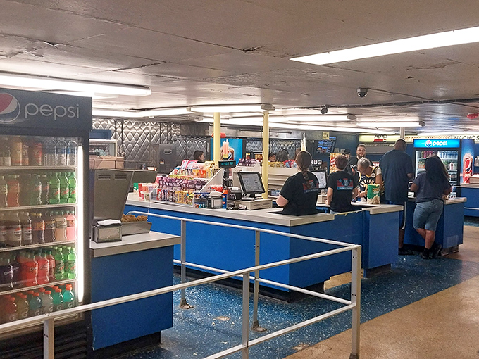 Where movie magic meets munchies: the bustling heart of the drive-in experience, serving up nostalgia one snack at a time.