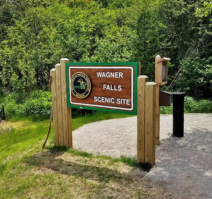 The welcoming entrance sign marks your arrival at this pocket-sized paradise, where natural wonders await just beyond the threshold.