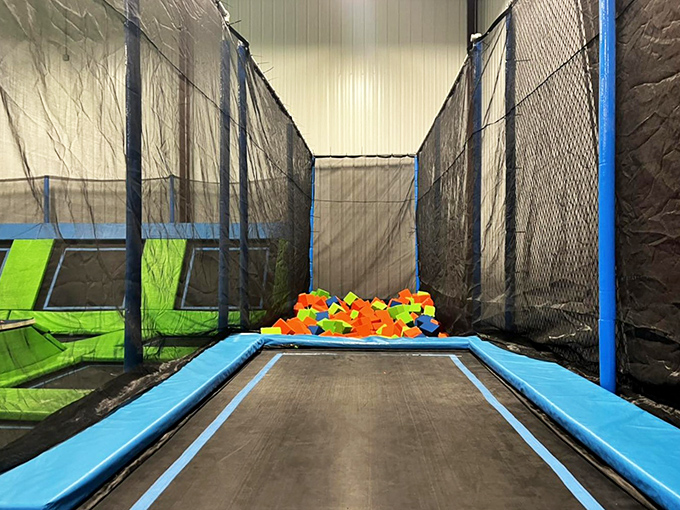 This specialized jump lane sends adventurers soaring into foam block oblivion, creating that fleeting moment of weightlessness we all secretly crave.