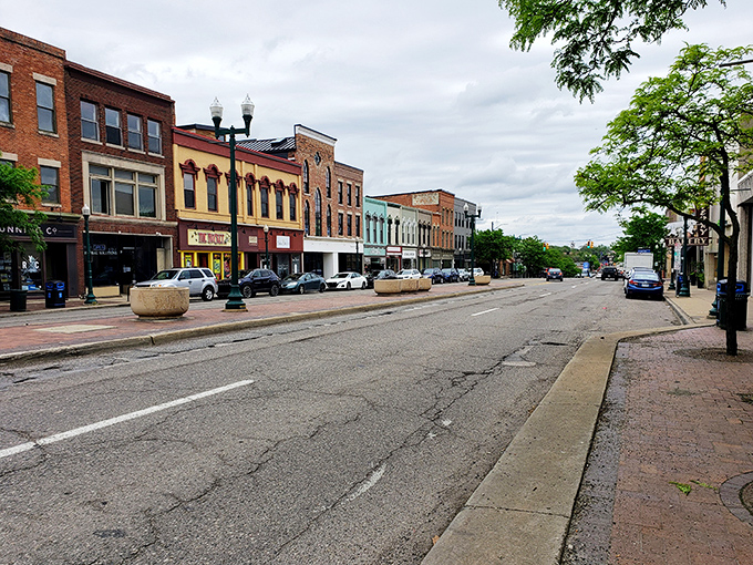 Historic storefronts line Ypsilanti's main thoroughfare, their brick facades housing everything from quirky boutiques to cozy cafes.