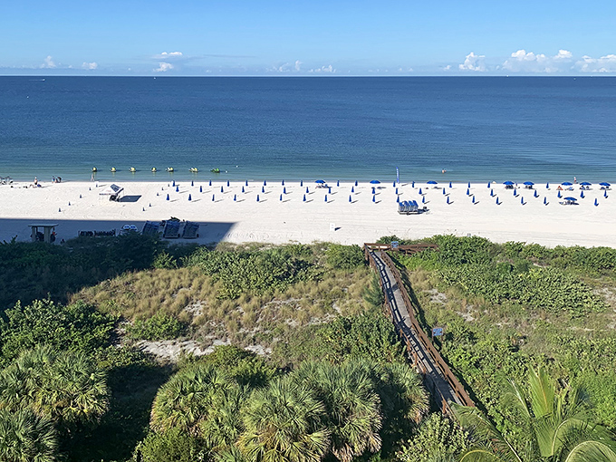 The beach stretches out like nature's welcome mat, inviting visitors to leave their footprints and take only memories.