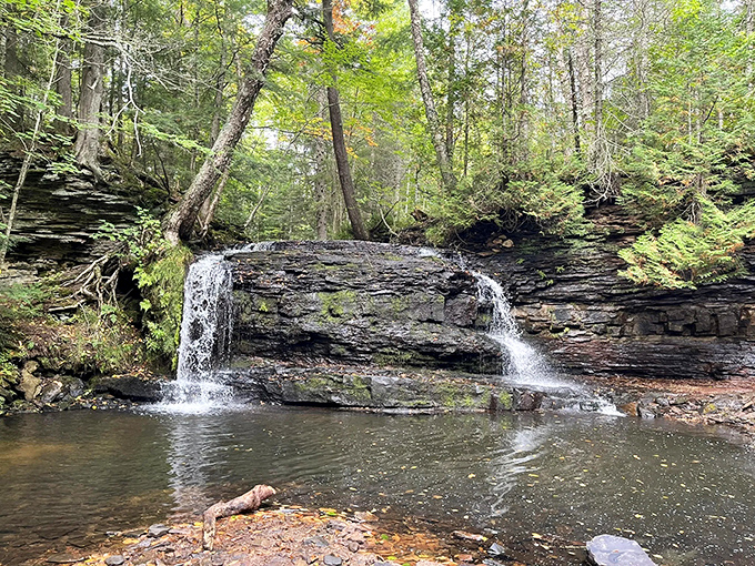 Standing before these falls feels like discovering a movie set that Mother Nature designed for a film about perfect wilderness moments.