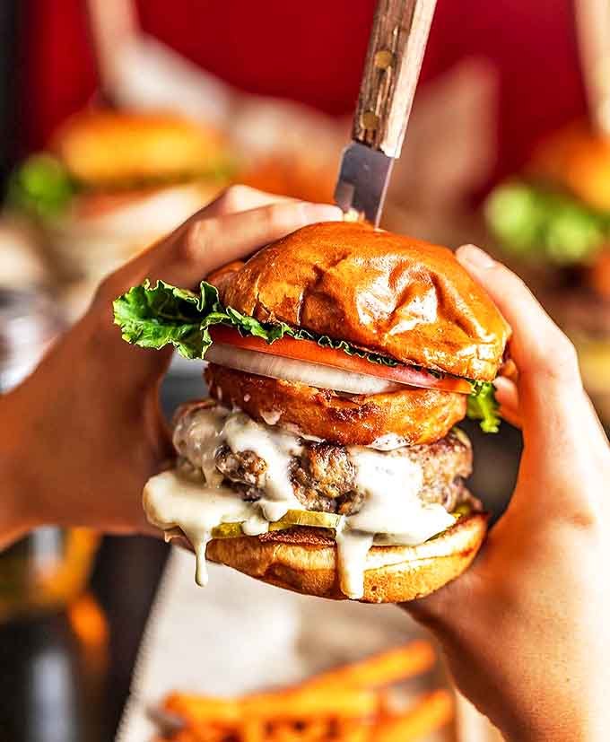 This isn't just a burger&mdash;it's a hand-held masterpiece where cheese meets beef in a relationship more perfect than any Hollywood romance.