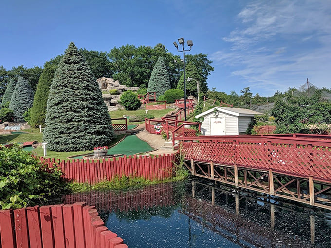 Red wooden bridges cross over the course like something from a storybook, making even a bogey feel somehow more picturesque.