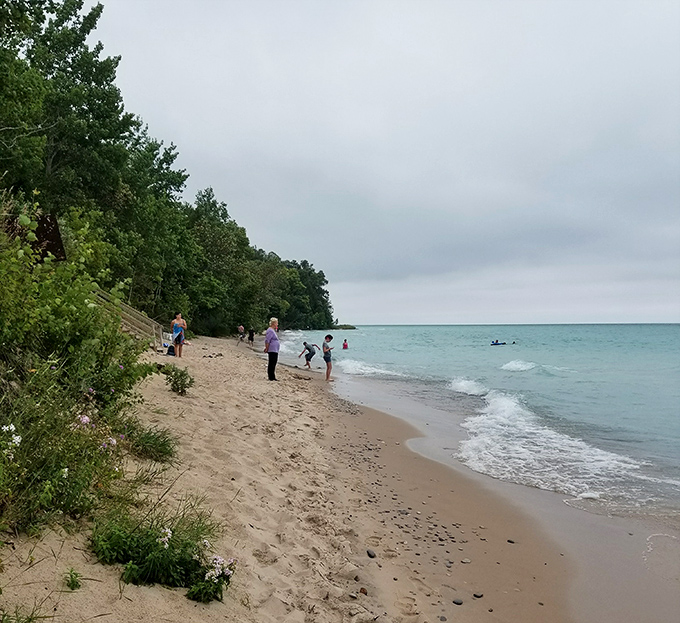Even on overcast days, Christmas Cove maintains its appeal, proving that great beaches don't need perfect weather to be perfect.