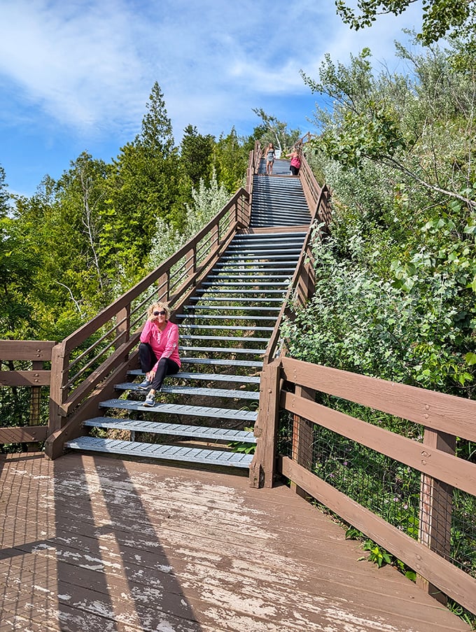 Visitors pause on the stairs, partly to catch their breath and partly because the view demands you stop and appreciate the moment.