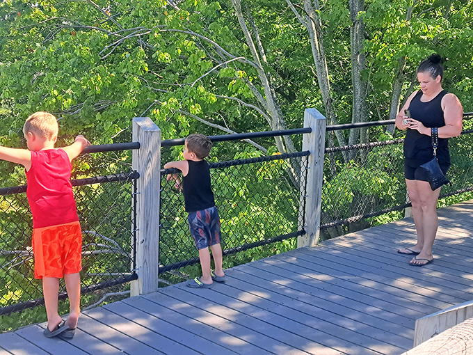 Young explorers discover that boardwalks make excellent runways for imagination, where every plank could be a bridge to adventure or just really good stomping.