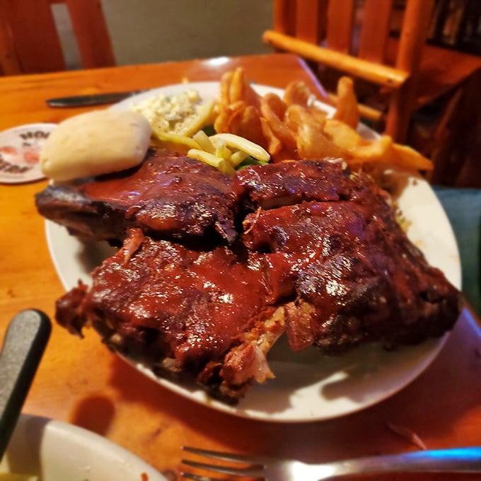 Fall-off-the-bone baby back ribs showcase the kitchen's talents beyond burgers, with a sauce that strikes perfect sweet-tangy balance.