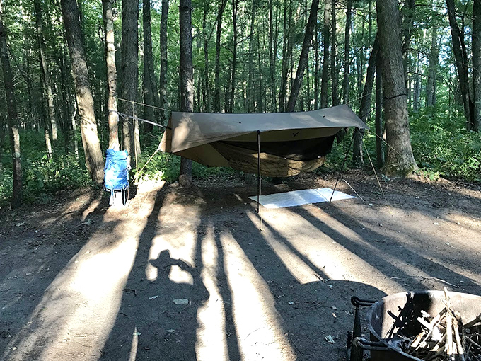 Wilderness camping 101: Hang your hammock, string your tarp, and pretend you're not secretly missing your memory foam mattress.
