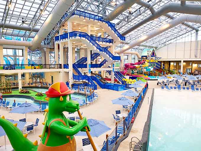 The massive indoor waterpark features colorful slides, play structures, and plenty of splashing opportunities for water-loving guests year-round.