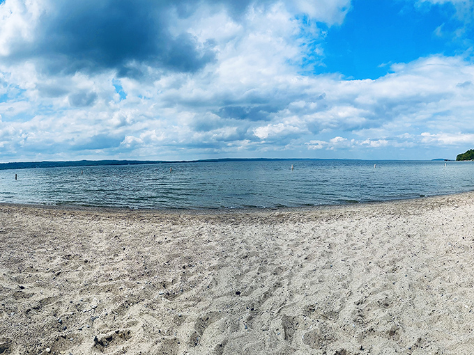 The bay stretches toward the horizon like nature's infinity pool, making you wonder why anyone bothers with crowded tropical resorts.