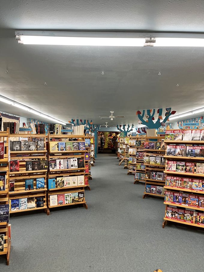 The book section stretches as far as the eye can see, proving that in the age of e-readers, the magic of physical books still captivates young imaginations.