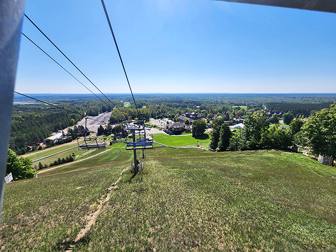 The chairlift journey upward builds delicious anticipation, offering panoramic views that make you forget you're in the Midwest, not the Rockies.