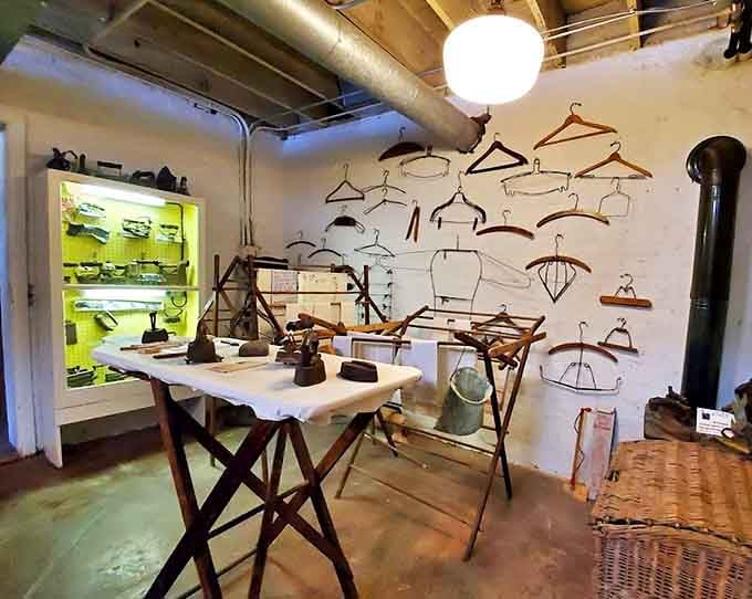 Who knew laundry could be fascinating? This collection of antique irons and wooden hangers reveals the labor behind crisp collars.