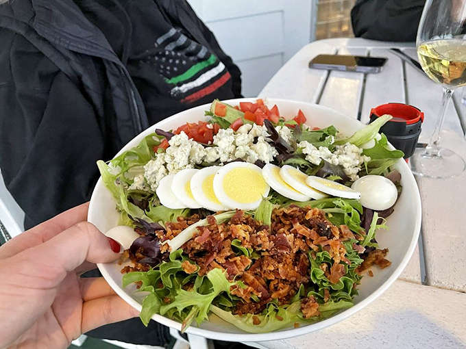 That Cobb salad is so beautifully composed it almost seems wrong to disturb it, but hunger trumps aesthetics every single time, as it should.