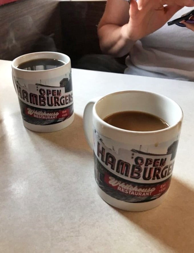 Coffee served in those thick white mugs that somehow make everything taste better &ndash; bottomless refills are just part of the charm.