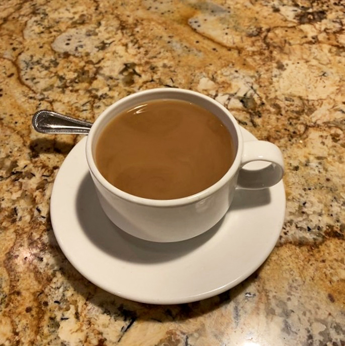 A proper Italian coffee provides the perfect finale – strong enough to cut through the richness of dessert, served in traditional white cups.