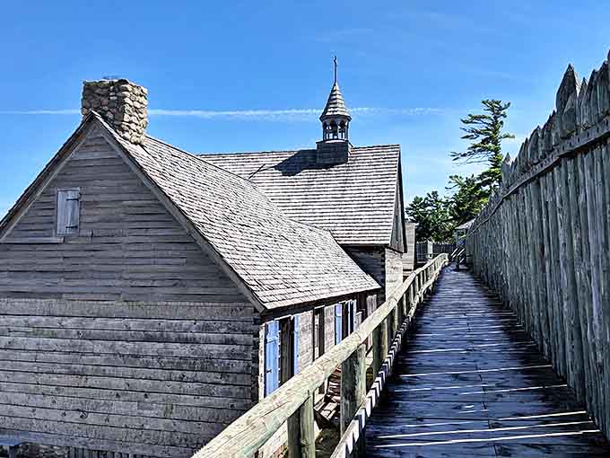 Follow in colonial footsteps along this wooden boardwalk, where every weathered plank tells a story of frontier life and strategic military positioning.