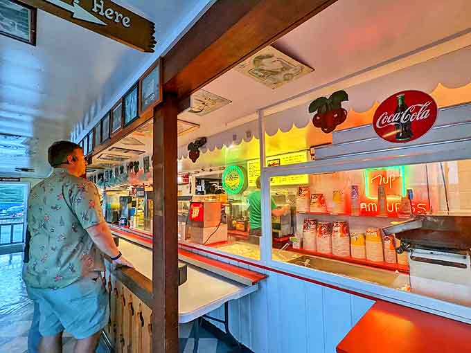 The concession counter glows with promise&mdash;real butter popcorn, hot dogs that snap, and treats that taste like childhood memories.
